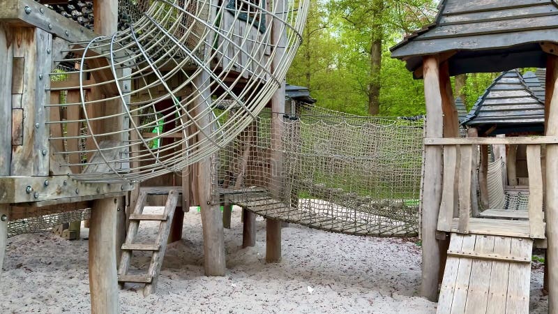 A Unique and Engaging Childrens Playground Featuring Various Wooden ...