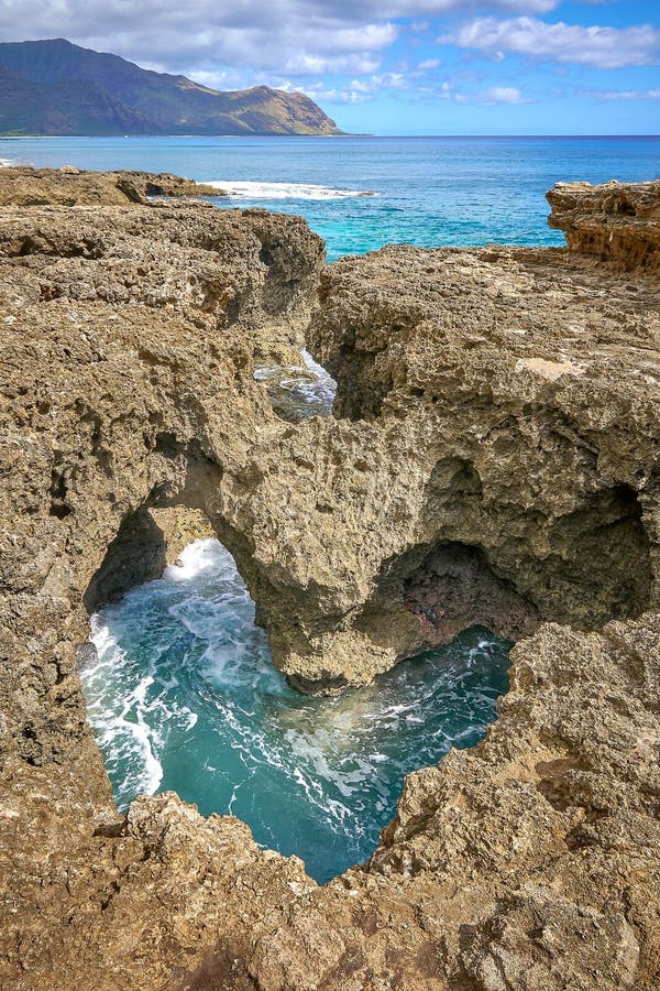 A Unique Heart Shaped Rock Formation Near the Ocean Stock Image - Image ...
