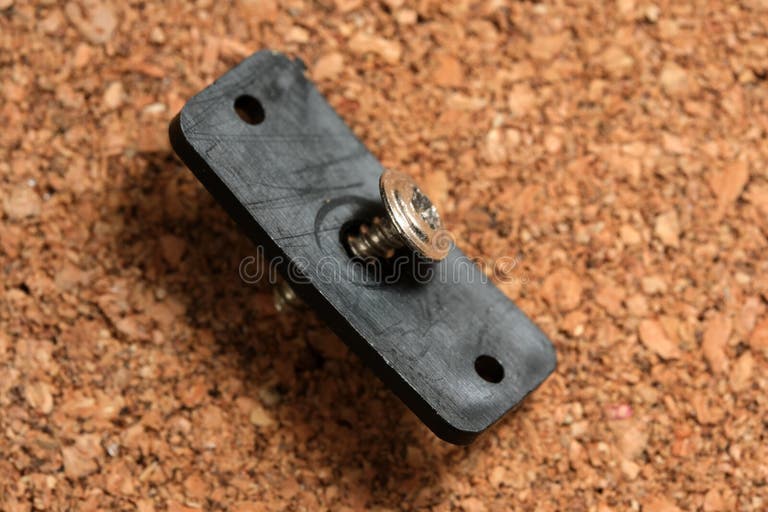 Unique Mounting Bracket Resting on a Cork Surface Stock Image - Image ...