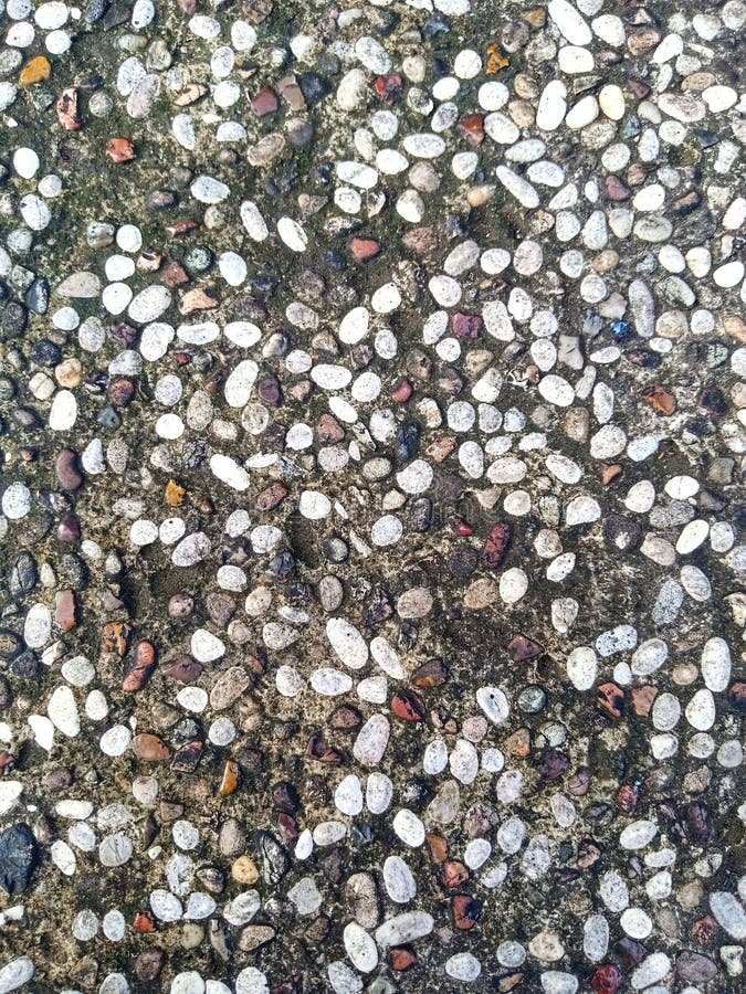 Unique Pattern of Cement and Stones on a Garden Walkway. Stock Image ...