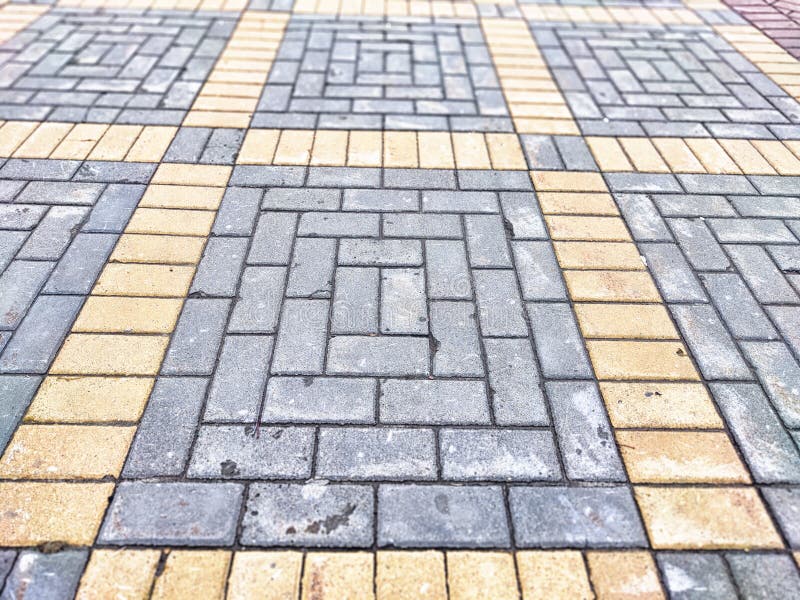 Unique Patterned Pavement Tiles Create a Visually Appealing Pathway ...