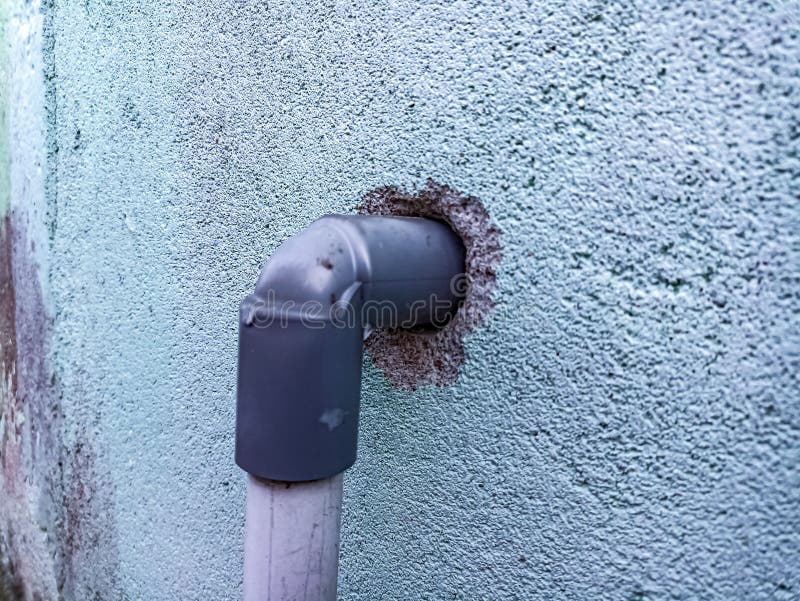 A Unique Photo of a Water Pipe on a Concrete Wall Stock Image - Image ...