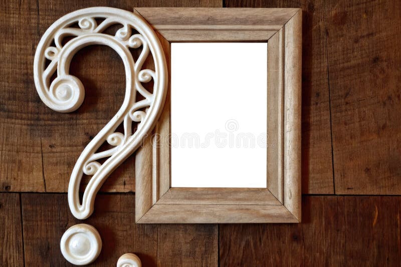 Question Mark Picture Frame Against Wooden Backdrop for Creative ...