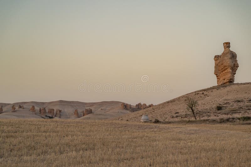 Unique Rock Forms in the Middle of Desert Stock Photo - Image of grass ...