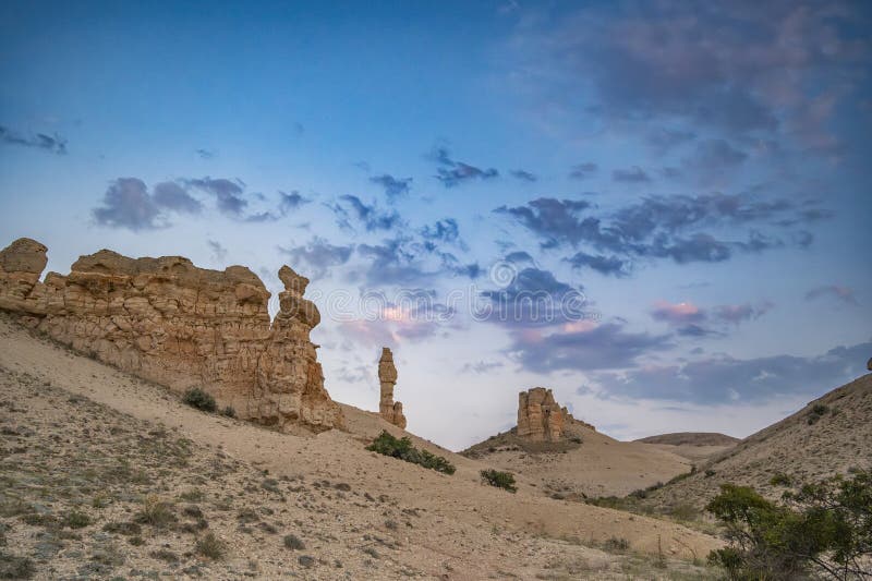 Unique Rock Forms in the Middle of Desert Stock Photo - Image of ...