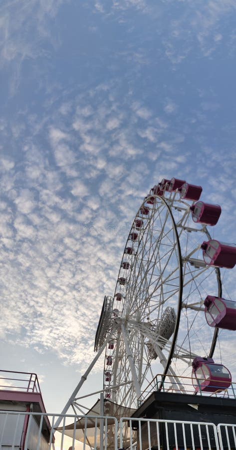 Unique Bright and Unique Sky Wheel Rides and Soft Clouds Stock Image ...