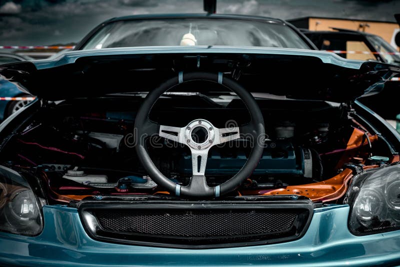 Unique Steering Wheel on a Blue Car Stock Image - Image of background ...