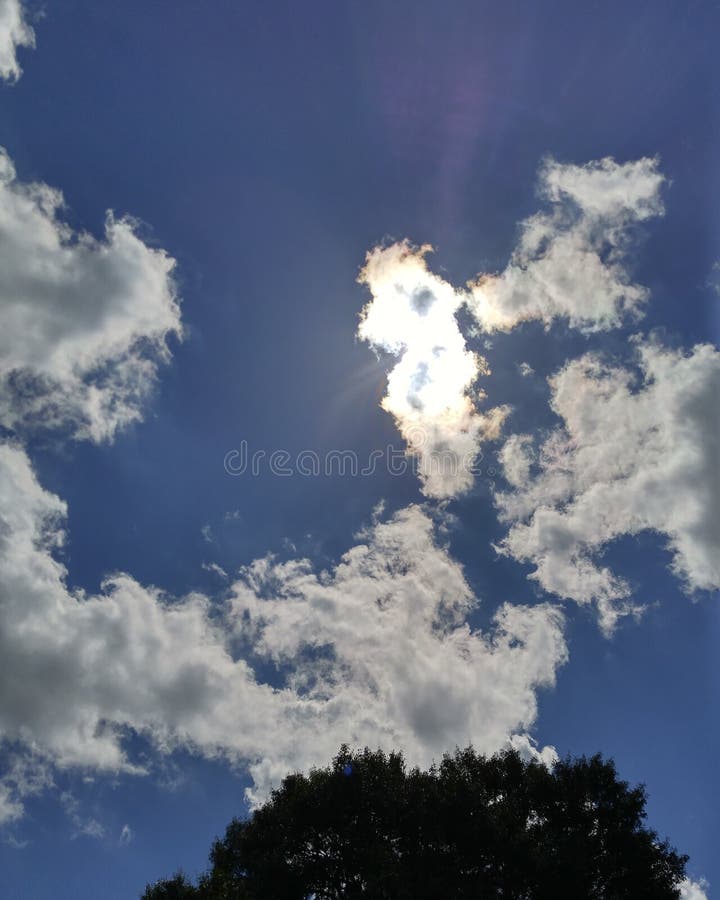 Unique Sunburst and Cloudy Blue Sky Stock Photo - Image of unique, blue ...