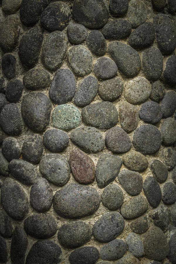 A Unique Wall Texture Using Naturally Rounded Stone. Stock Image ...