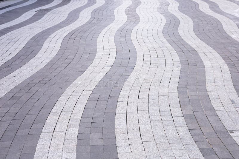Unique Wave Patterns Paving Stones Create Striking Urban Walkway Design ...