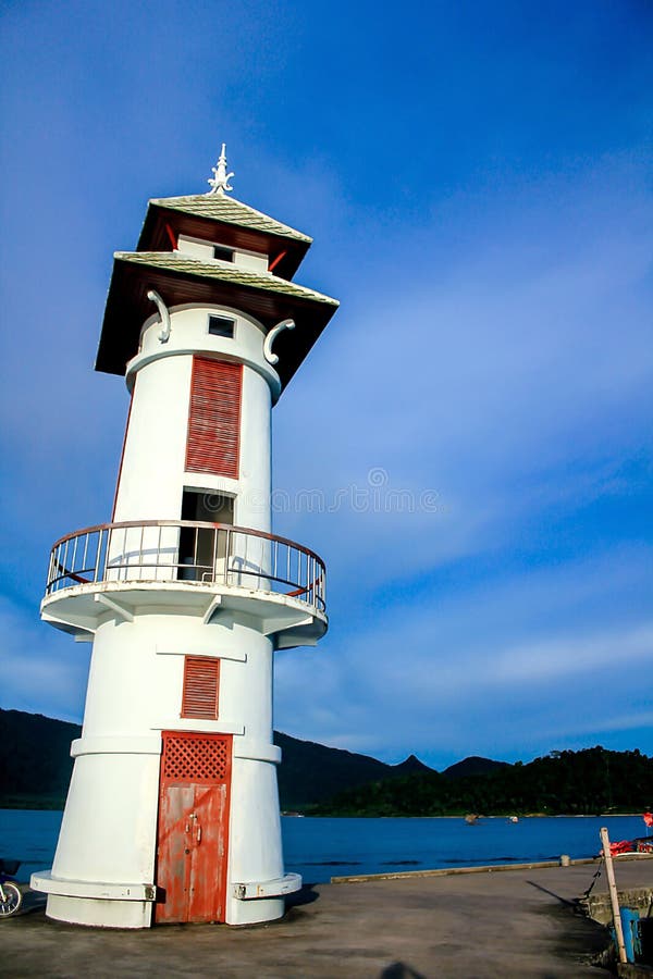 White Lighthouse is Prominent. the Bay`s Identity. Stock Photo - Image ...
