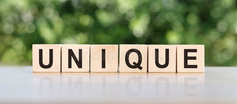 Unique Word Written on Wooden Blocks. the Text is Written in Black ...