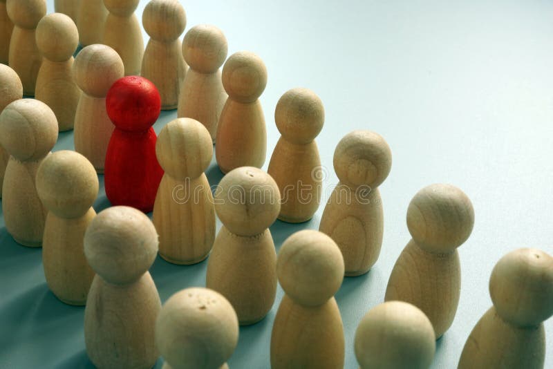 Uniqueness Concept. One Unique Figurine in the Crowd Stock Photo ...