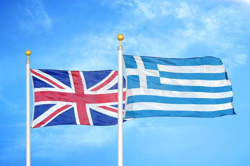 United Kingdom And Greece Two Flags On Flagpoles And Blue Cloudy Sky ...