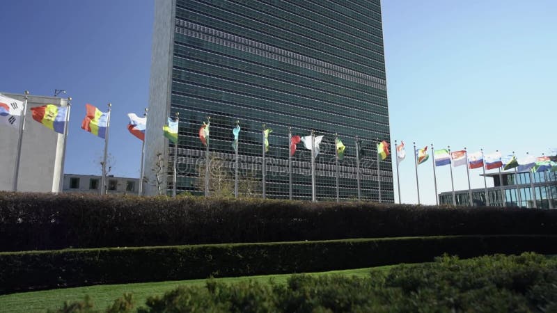 United Nations Flags in Front of UN Building in Manhattan. Slow Motion ...