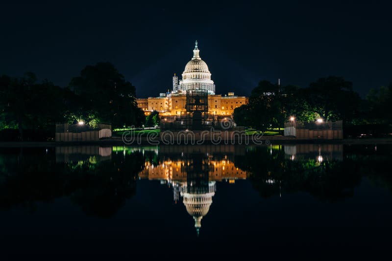 The United States Capitol Building and Reflecting Pool at Night, in ...