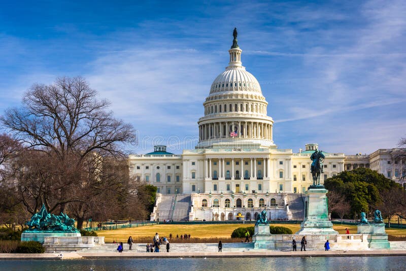 The United States Capitol and Reflecting Pool in Washington, DC ...