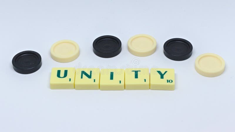 Unity in Alphabet Letters and Playing Pieces from Board Games Stock ...
