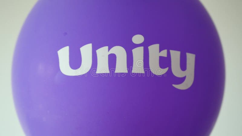 Unity Text on a Purple Color Ballon, Stock Footage - Video of circle ...