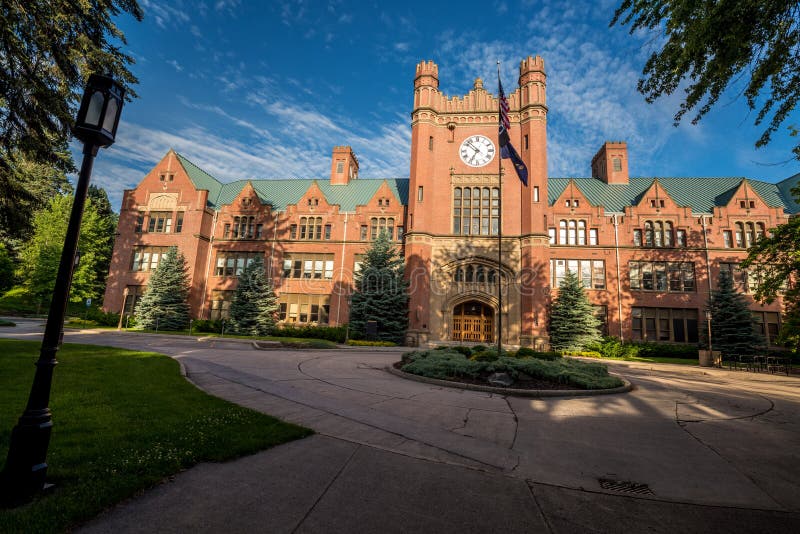 Univeristy Administration Building with Clouds Stock Photo - Image of ...