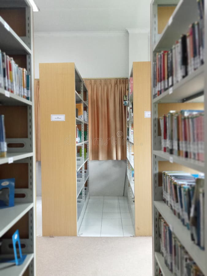 University library aisle stock photo. Image of knowledge - 264494550