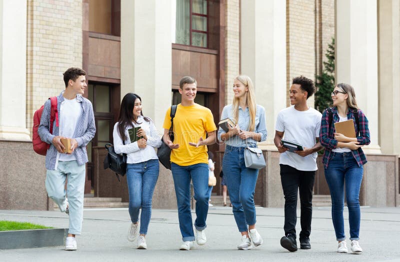 University Life. Classmates Walking Outside and Talking Stock Photo ...