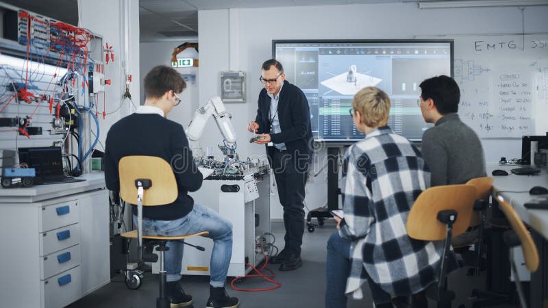 University Robotics Class. White Male Teacher Explaining Engineering To ...