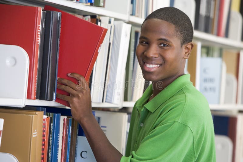 University Student Choosing Book in Library Stock Image - Image of ...