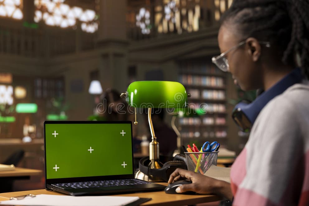 University Student Collecting Notes from Academic Sources Next To Green ...