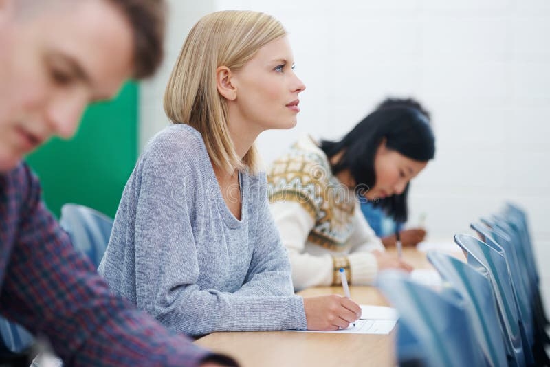 University Student, Desk and Test in Classroom or Thinking As ...