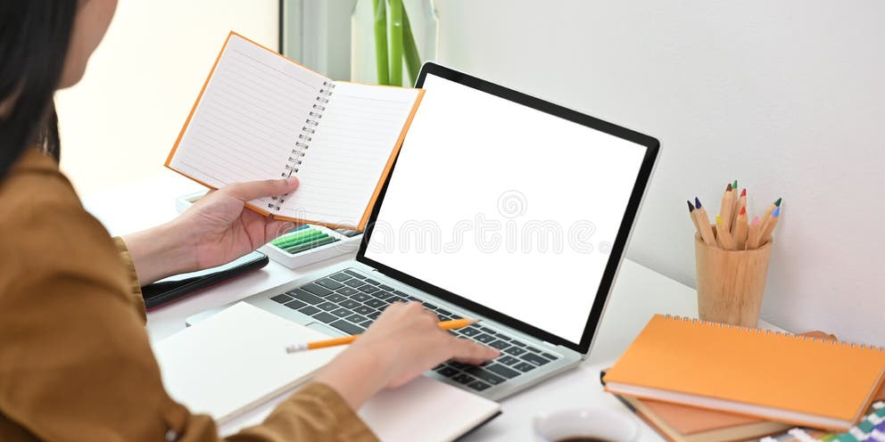 University Student Doing Her Homework by Using White Blank Screen ...