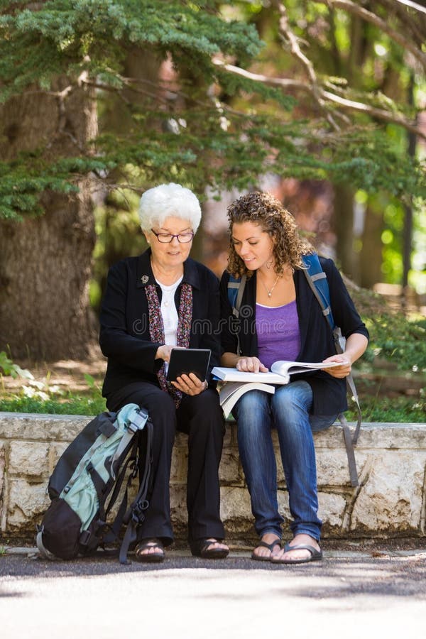 University Student and Professor Stock Photo - Image of backpack ...