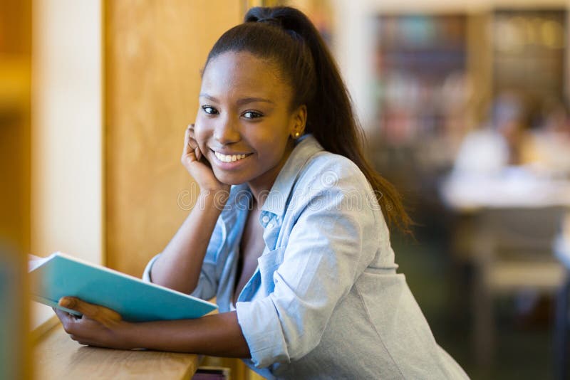 University student reading stock image. Image of black - 56057723