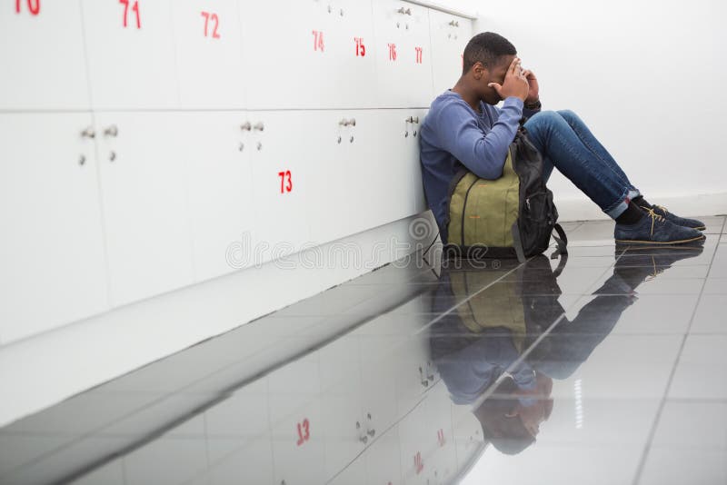 University Student Sitting Alone with His Hands on Face Stock Image ...