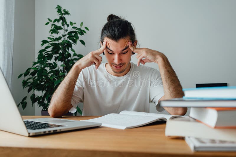 University Student Studying and Making Notes at Campus Stock Photo ...
