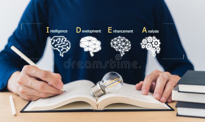 University Student Studying, Writing and Reading Book or Textbook with ...