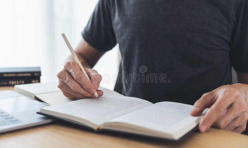 University Student Using Laptop or Computer for Studying or Learning ...