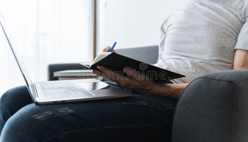 University Student Using Laptop or Computer for Studying or Learning ...