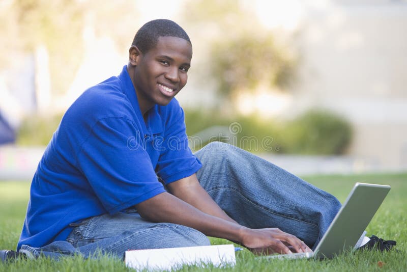 University Student Using Laptop Outside Stock Photo - Image of ...