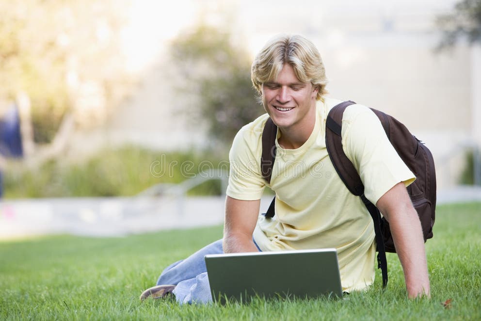 University Student Using Laptop Outside Stock Image - Image of park ...