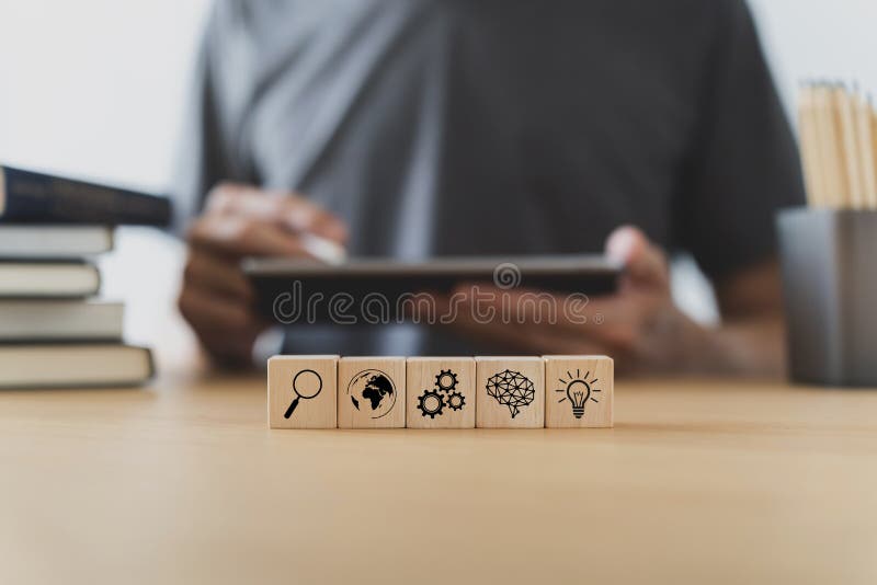 University Student Using Tablet for Studying, Working or Reading Via ...