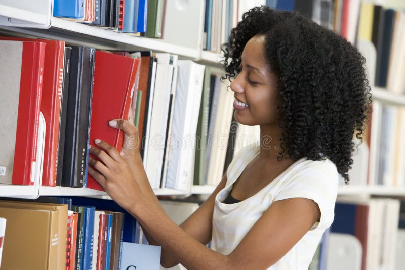 University Student Working in Library Stock Photo - Image of choosing ...