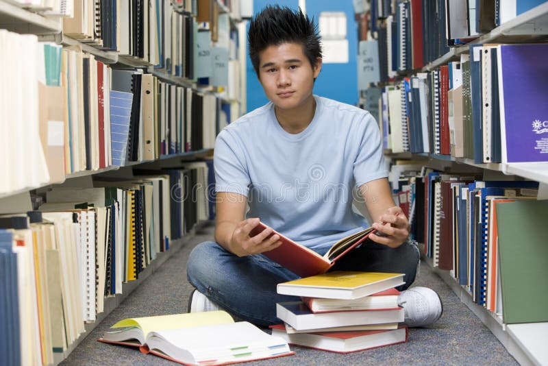 University Student Working in Library Stock Photo - Image of horizontal ...