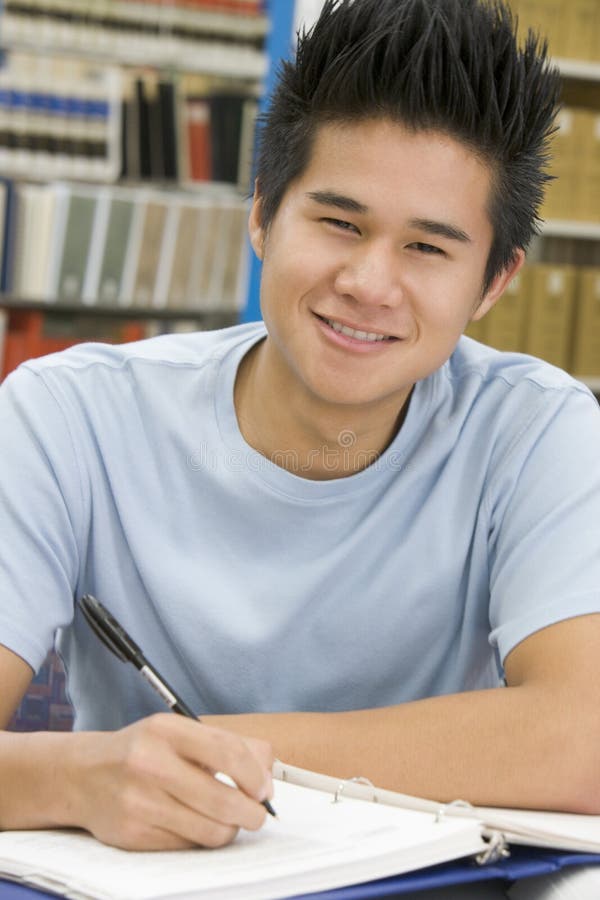 University Student Working in Library Stock Photo - Image of horizontal ...