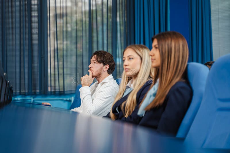 Group of University Students Expanding Their Knowledge, Listening ...