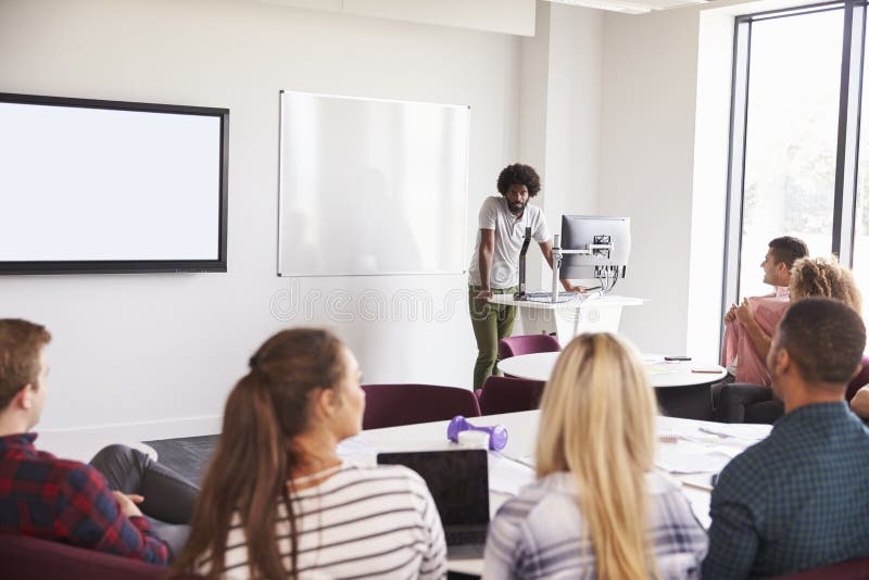 Students at Desks Attending Lecture on Campus Stock Image - Image of ...