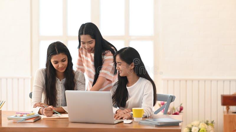 University Students are Doing E-learning while Sitting in the Living ...