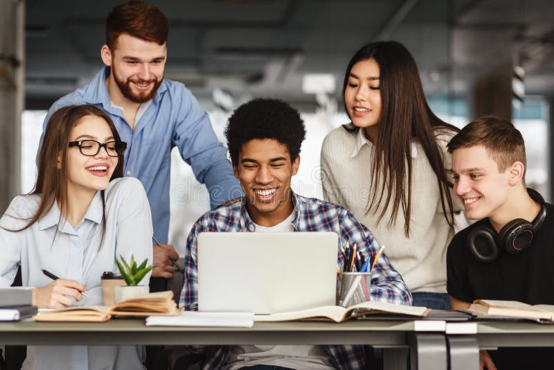 University Students Doing Group Project in Library Stock Image - Image ...