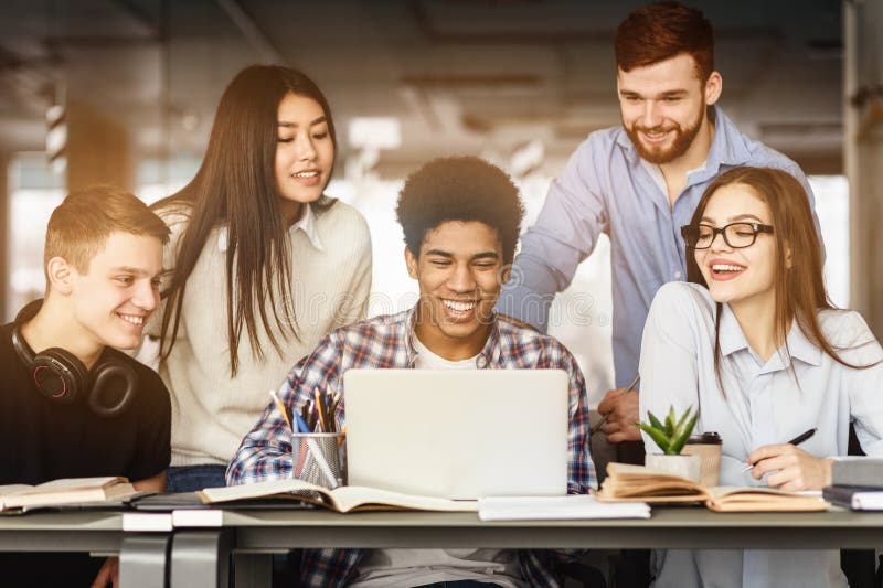 University Students Doing Group Project in Library Stock Image - Image ...