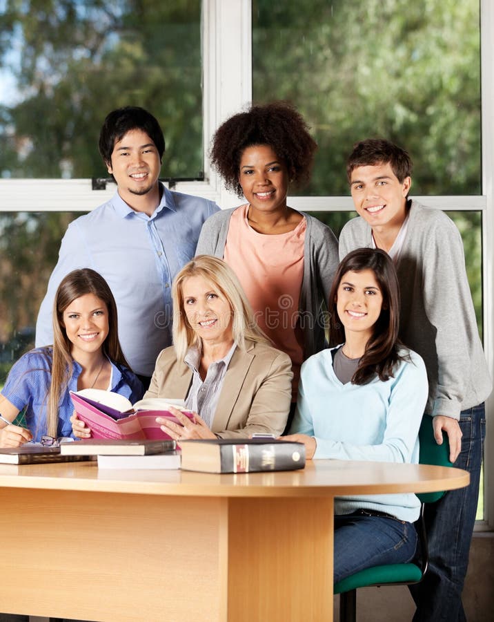 University Students and Professor with Books in Stock Photo - Image of ...
